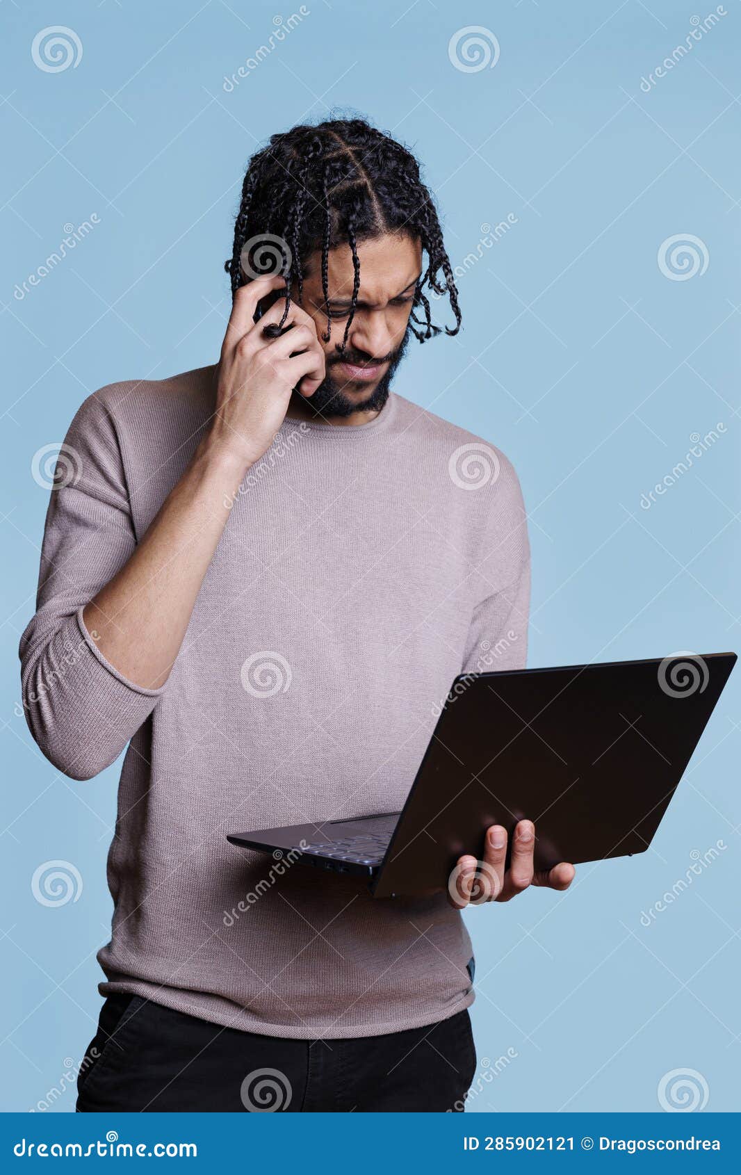Puzzled Arab Programmer Solving Code Problem on Laptop Stock Image ... Puzzled Arab Programmer Solving Code Problem on Laptop Stock Image ...