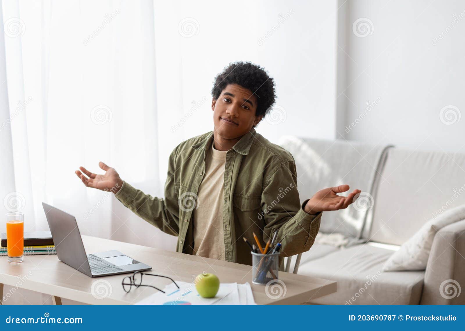 Puzzled Black Student Sitting in Front of Laptop, Not Understanding ...