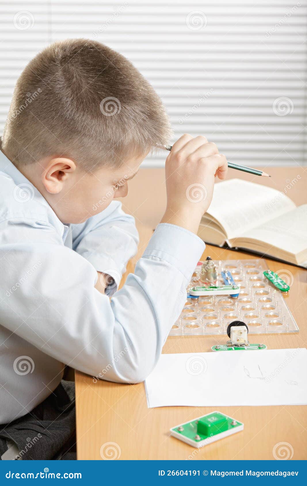 Puzzled Boy Looking at Curcuit Stock Image - Image of homework ...