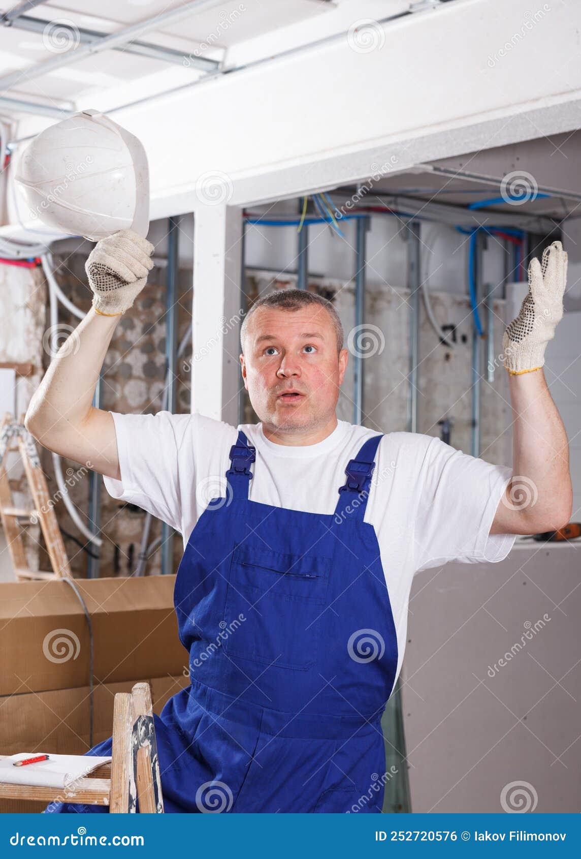 Puzzled builder stock photo. Image of examining, adult - 252720576