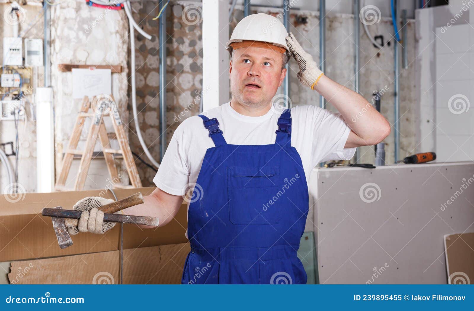 Puzzled builder stock image. Image of gesturing, frightened - 239895455