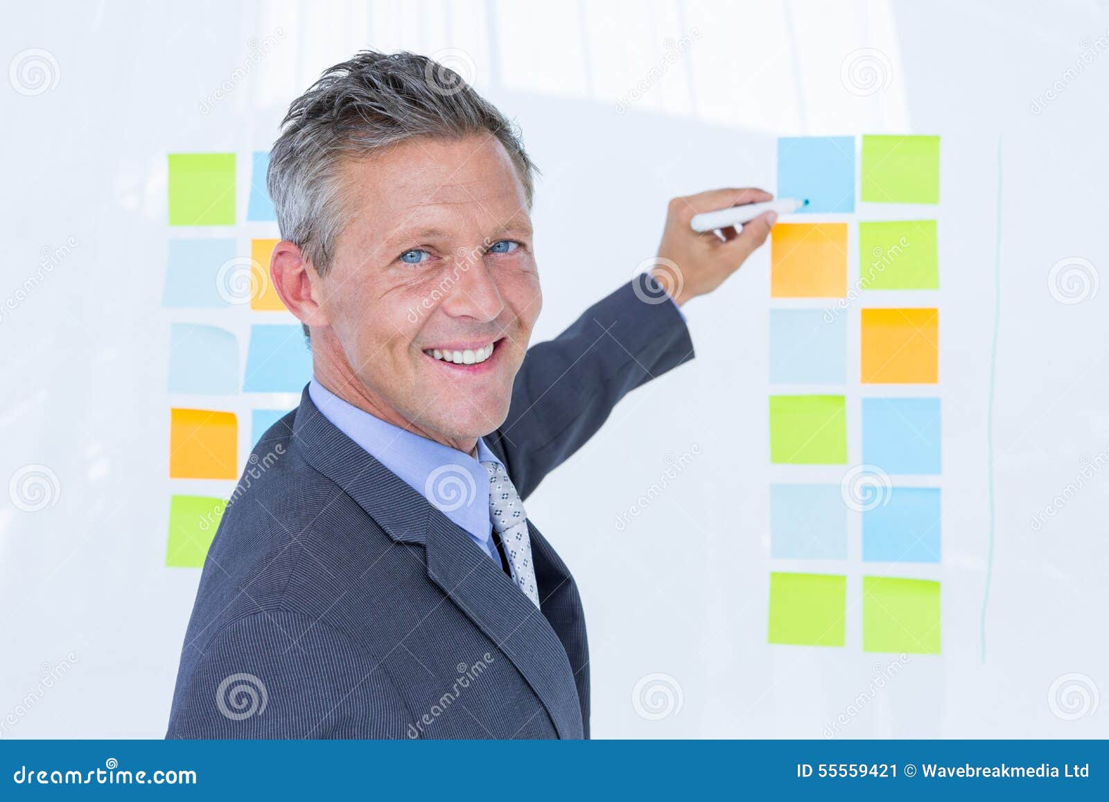 Puzzled Businessman Looking Post Its on the Wall Stock Image - Image of ...