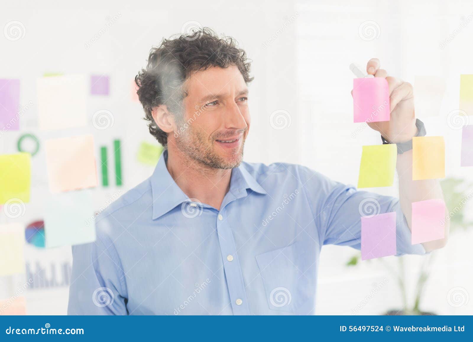 Puzzled Businessman Looking Post Its on the Wall Stock Photo - Image of ...