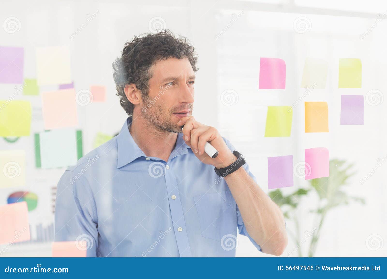 Puzzled Businessman Looking Post Its on the Wall Stock Image - Image of ...