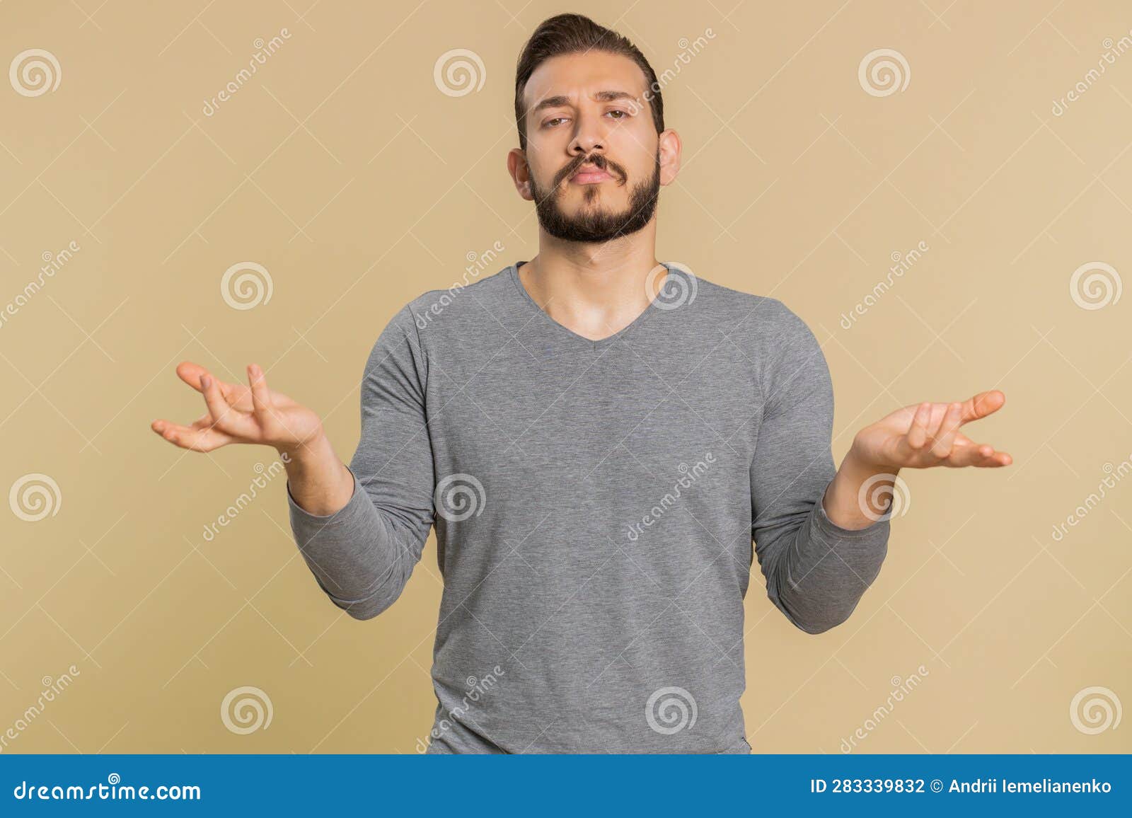 Puzzled Clueless Uncertain Man Raising Hands in Helpless, Embarrassed ...