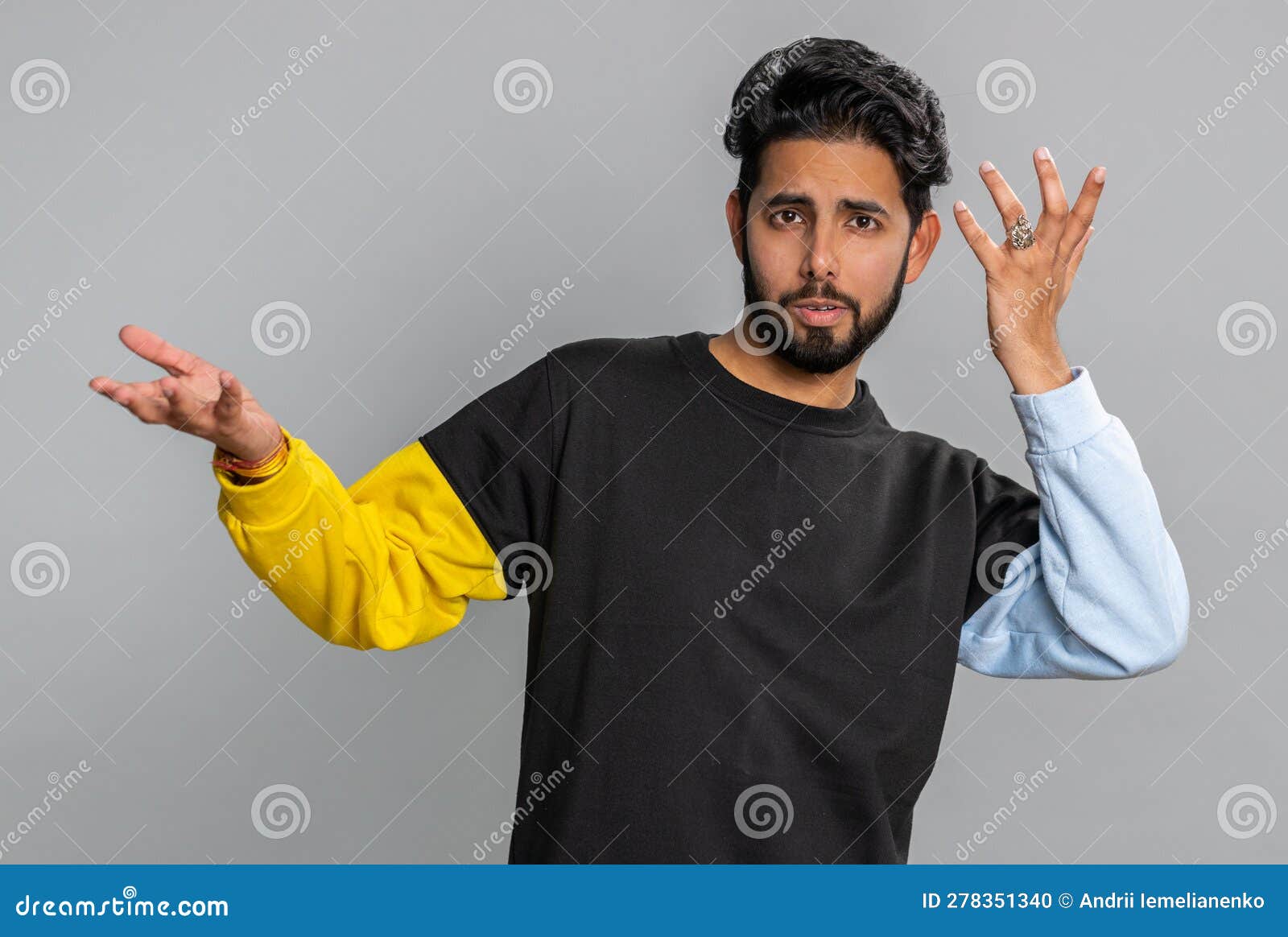 Puzzled Clueless Uncertain Man Raising Hands In Helpless Embarrassed Confused By Difficult