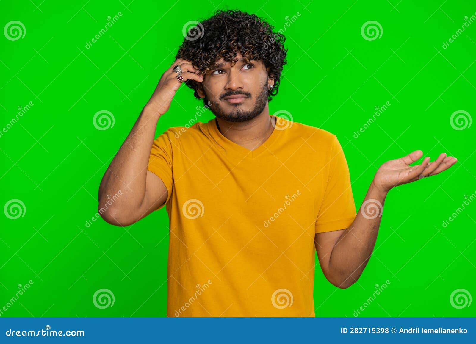 Puzzled Clueless Uncertain Man Raising Hands in Helpless, Embarrassed ...