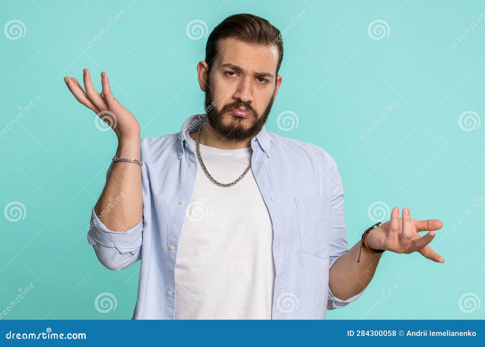 Puzzled Clueless Uncertain Man Raising Hands in Helpless, Embarrassed ...