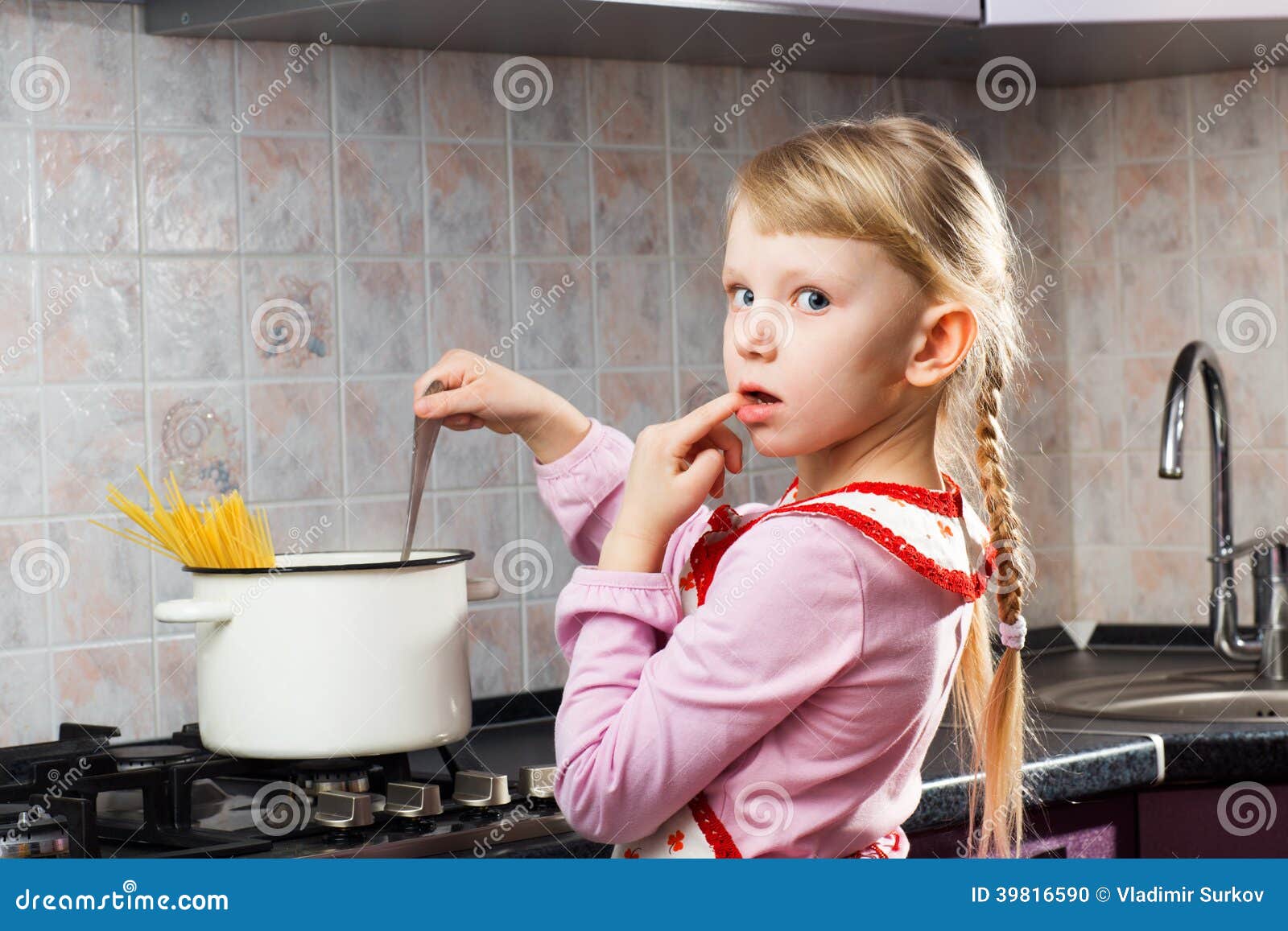 Puzzled Girl Cooking in the Kitchen Stock Photo - Image of interior ...