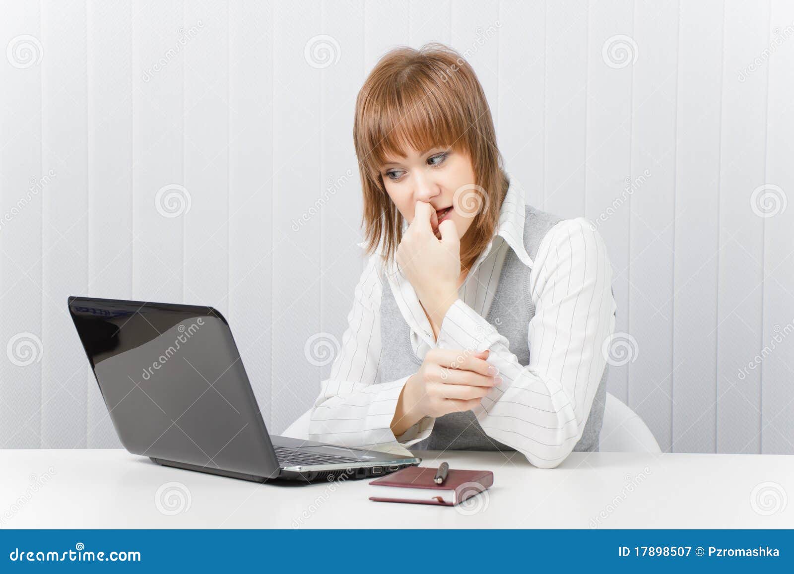 Puzzled girl with laptop stock image. Image of adult - 17898507