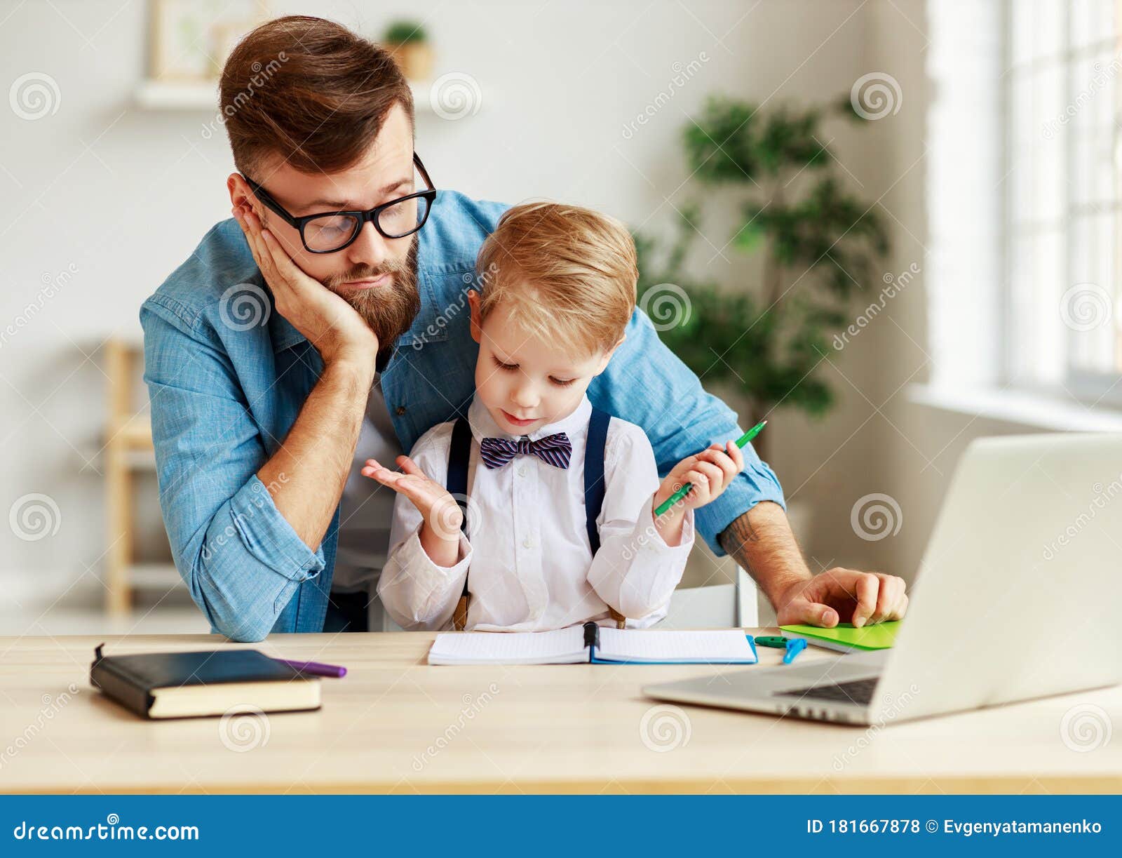 Man with Kid Doing Homework Together Stock Photo - Image of notebook ...