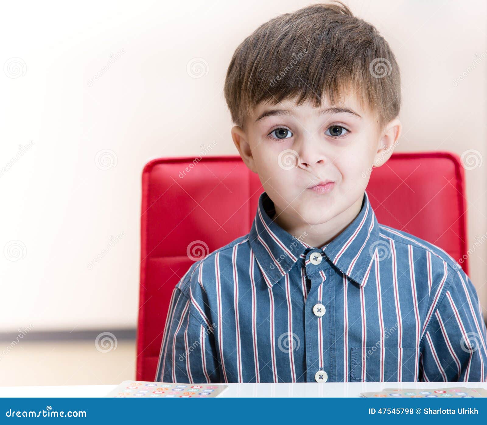 Puzzled little boy stock photo. Image of facial, emotional - 47545798