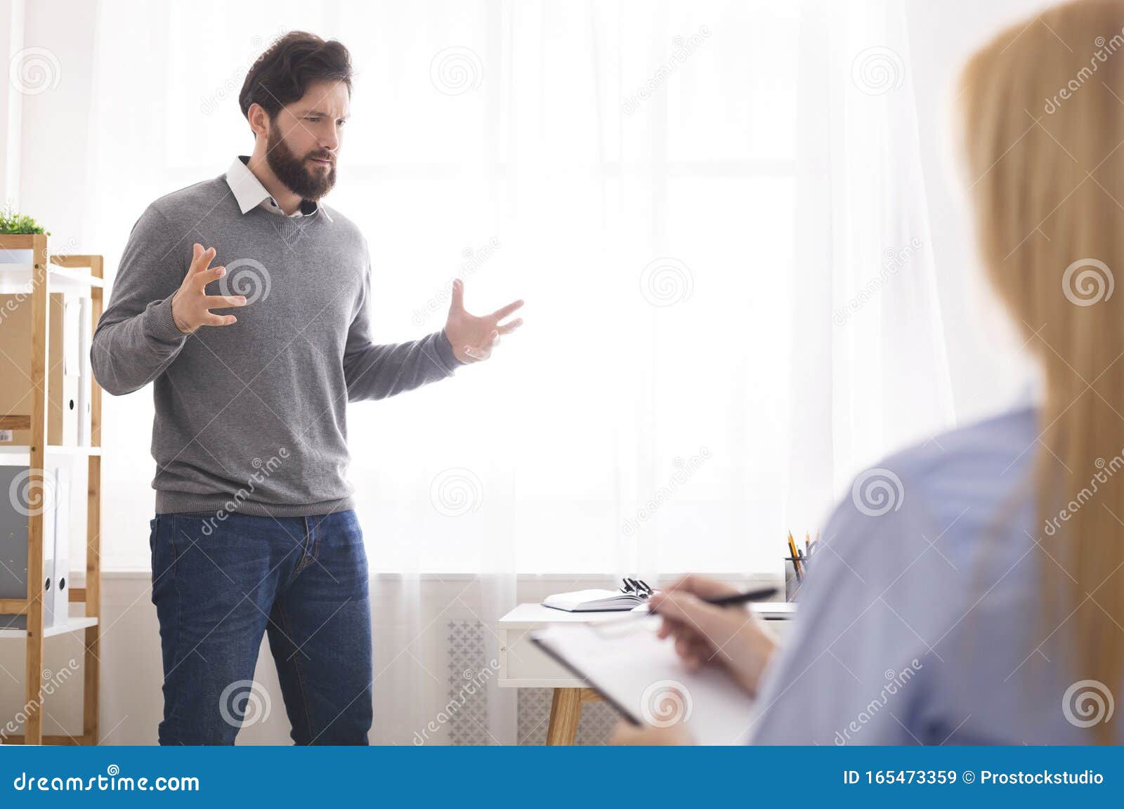 Puzzled Man Talking about Life Problems with Psychologist Stock Image ...