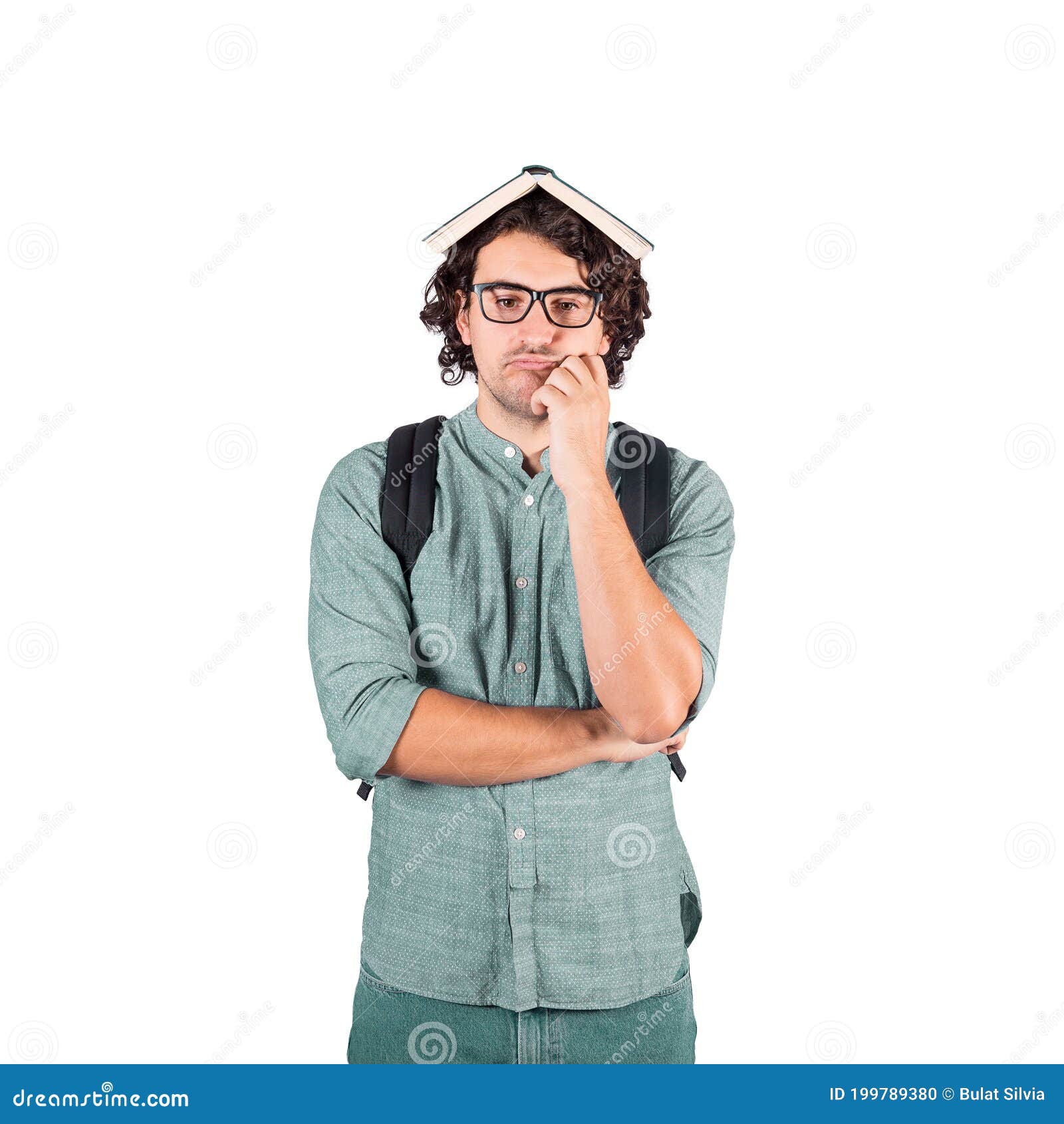 Puzzled and Perplexed Student Guy Keeps Hand Under Cheek, Holding a ...