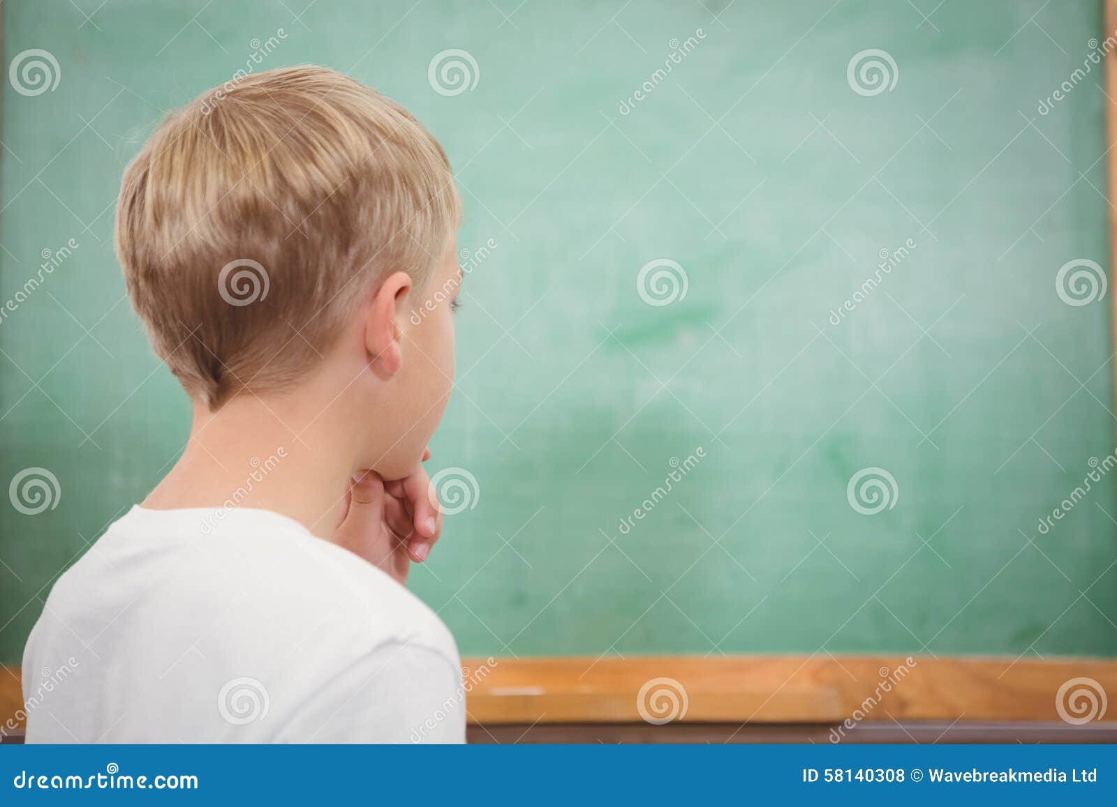 Puzzled Student Looking at Blackboard Stock Photo - Image of person ...