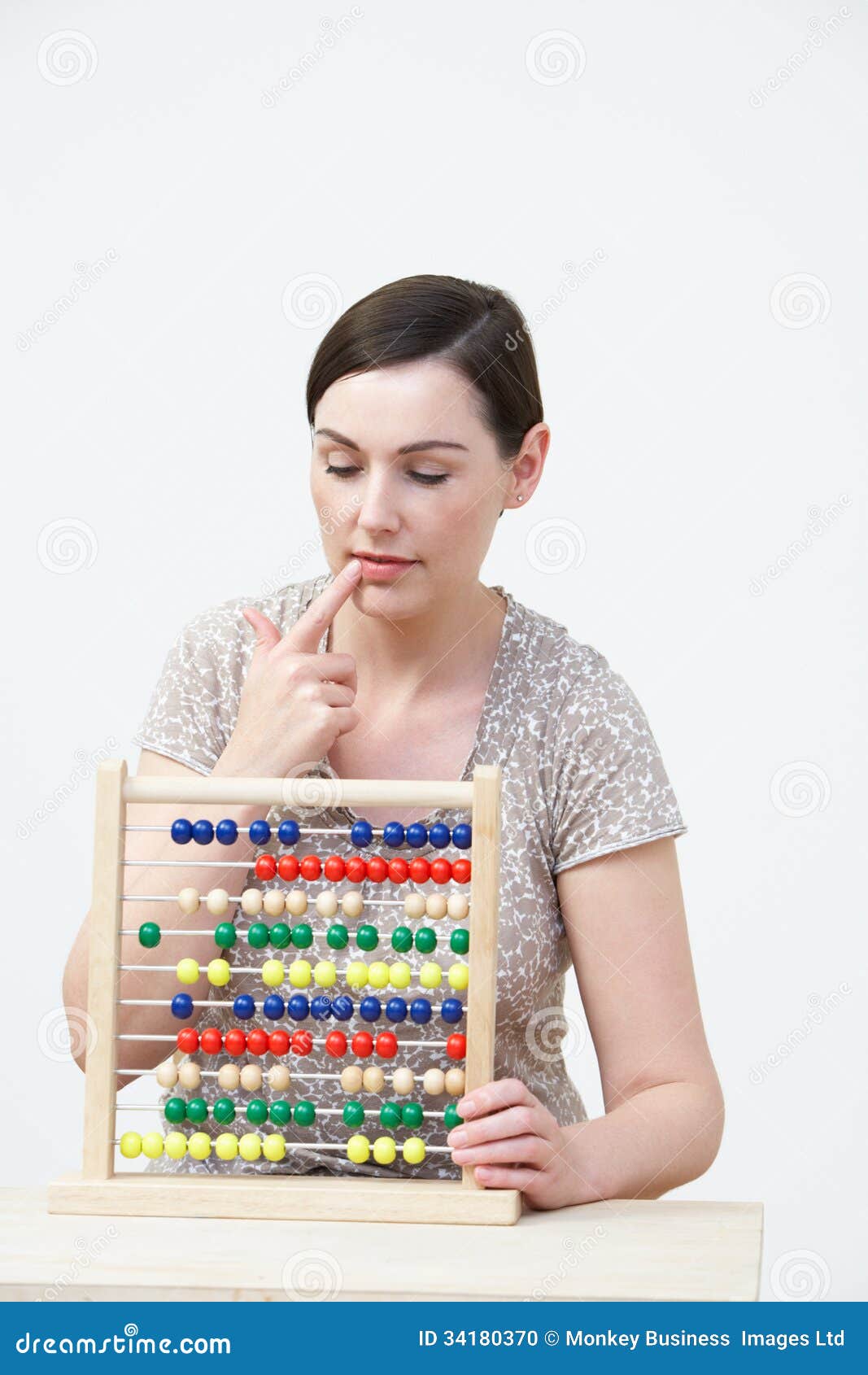 Puzzled Woman Using Abacus stock photo. Image of person - 34180370
