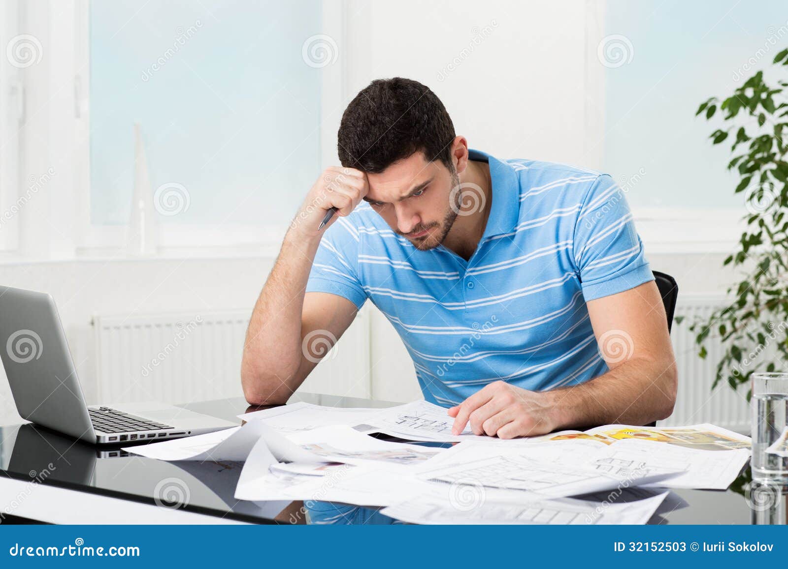 Puzzled Young Designer Sitting at the Table Stock Image - Image of ...