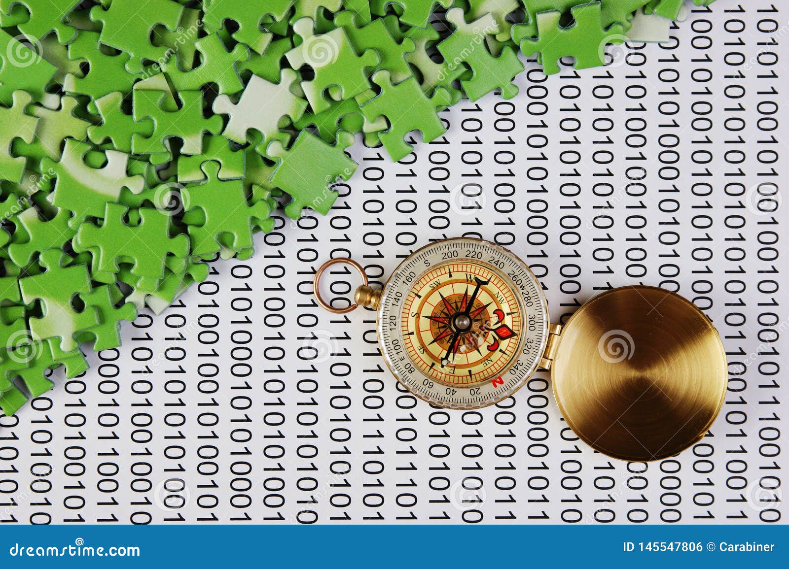 Puzzles and compass stock photo. Image of electronic - 145547806