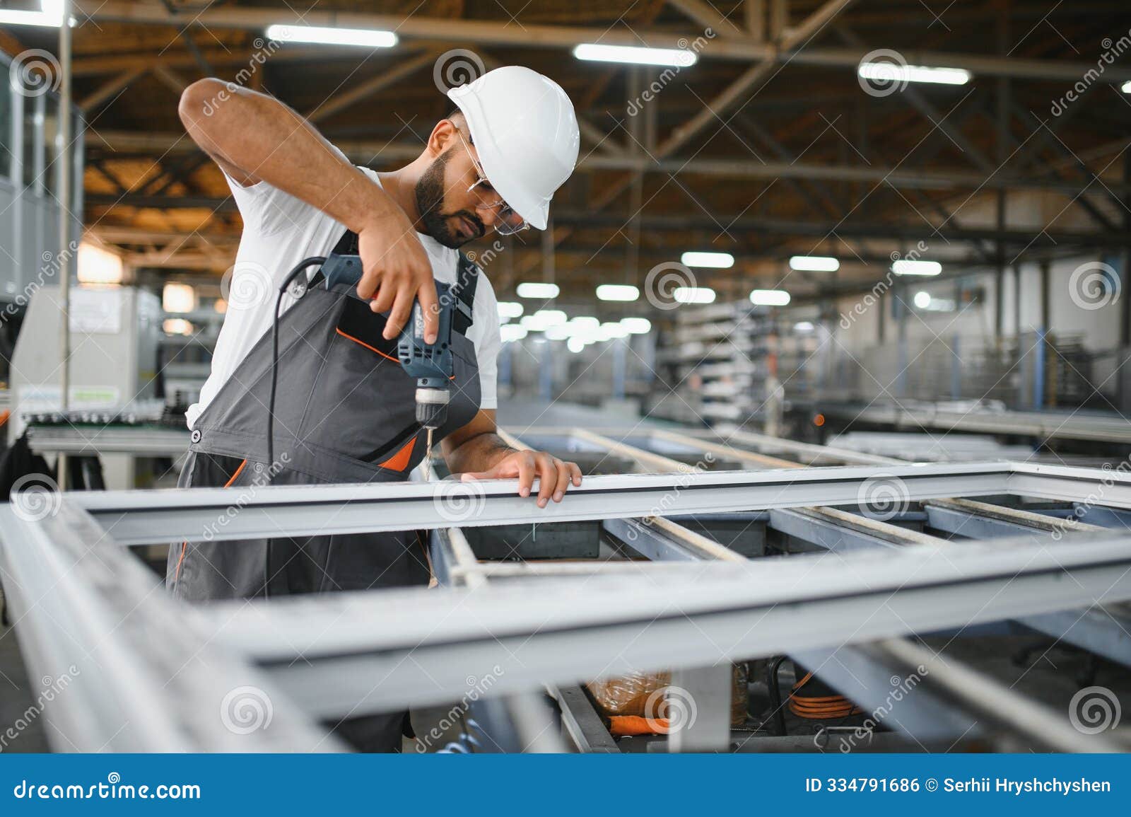 PVC Industry Worker or Operator Making Frames for Windows and Doors ...