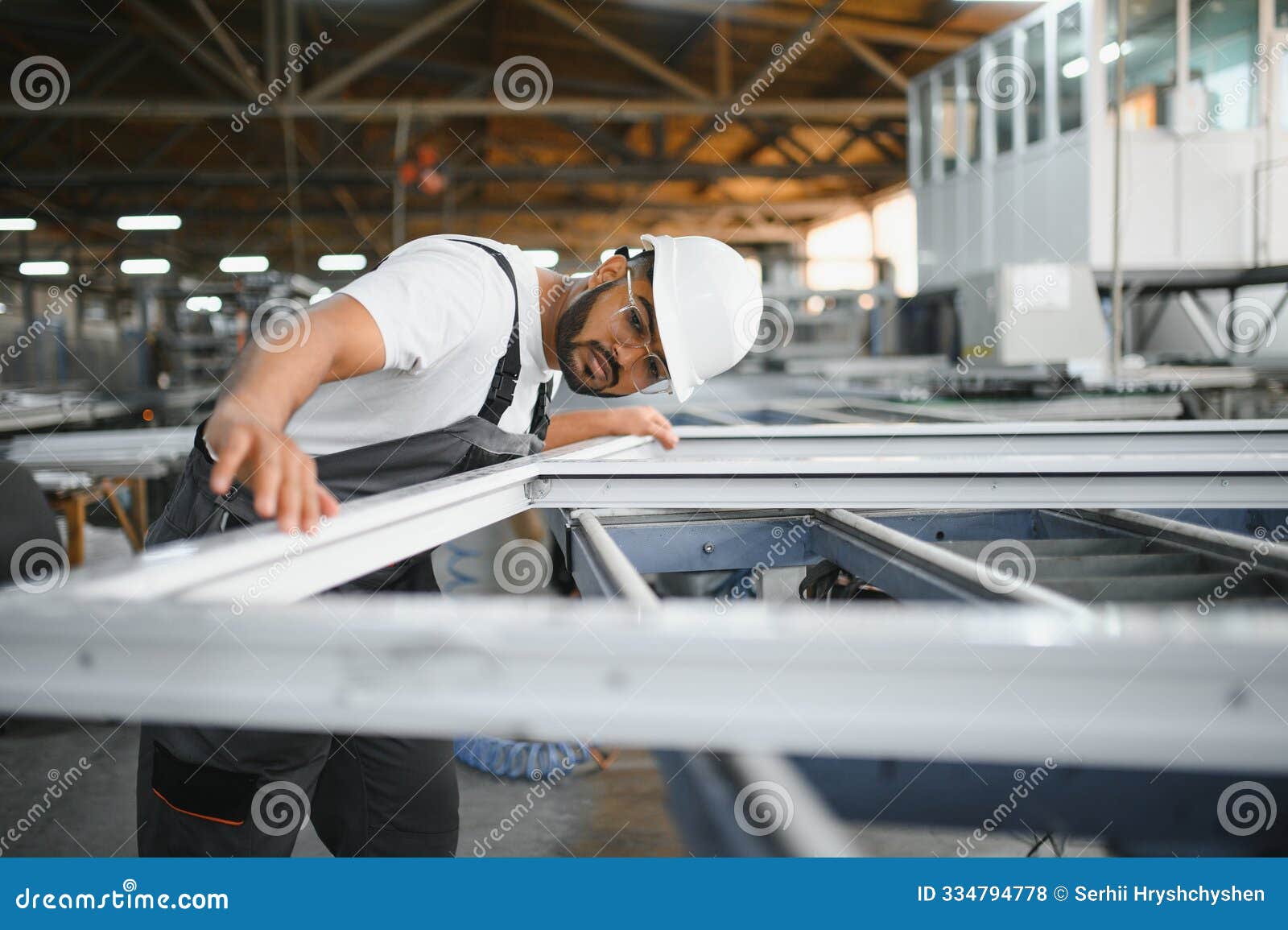 PVC Industry Worker or Operator Making Frames for Windows and Doors ...