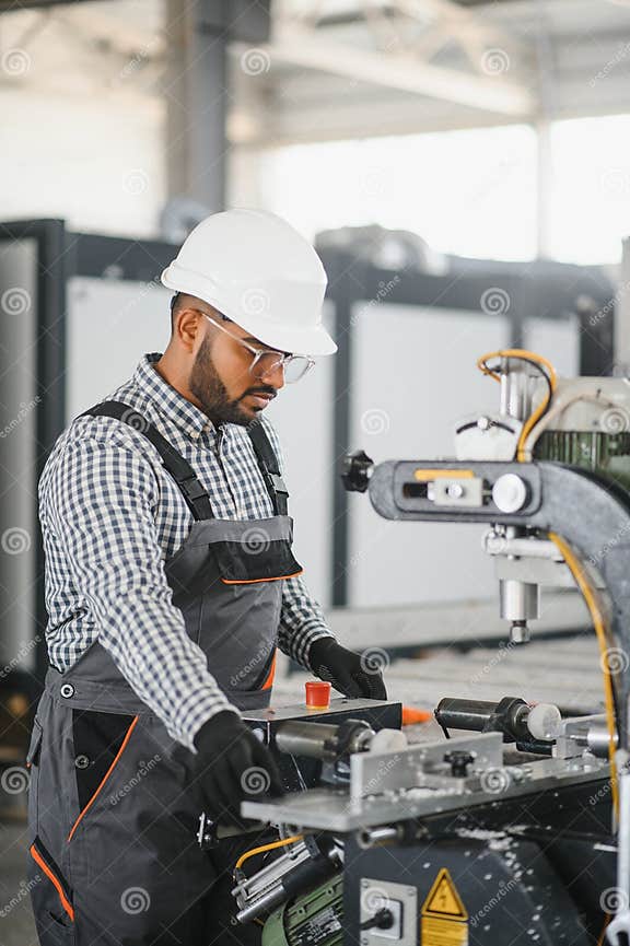 PVC Industry Worker or Operator Making Frames for Windows and Doors ...