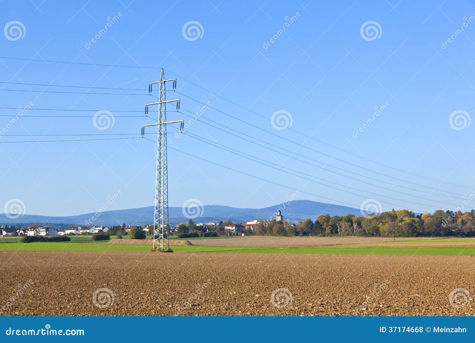 Pylon in Rural Landscape Under Blue Sky Stock Photo - Image of grass ...