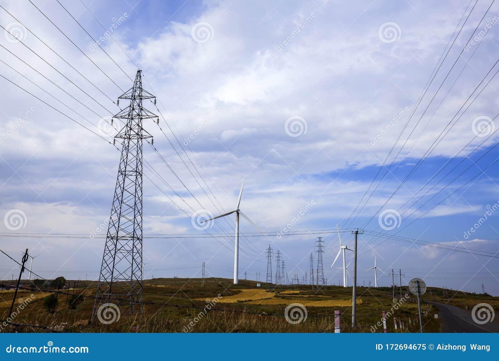 Pylon and wind turbines stock image. Image of environment - 172694675