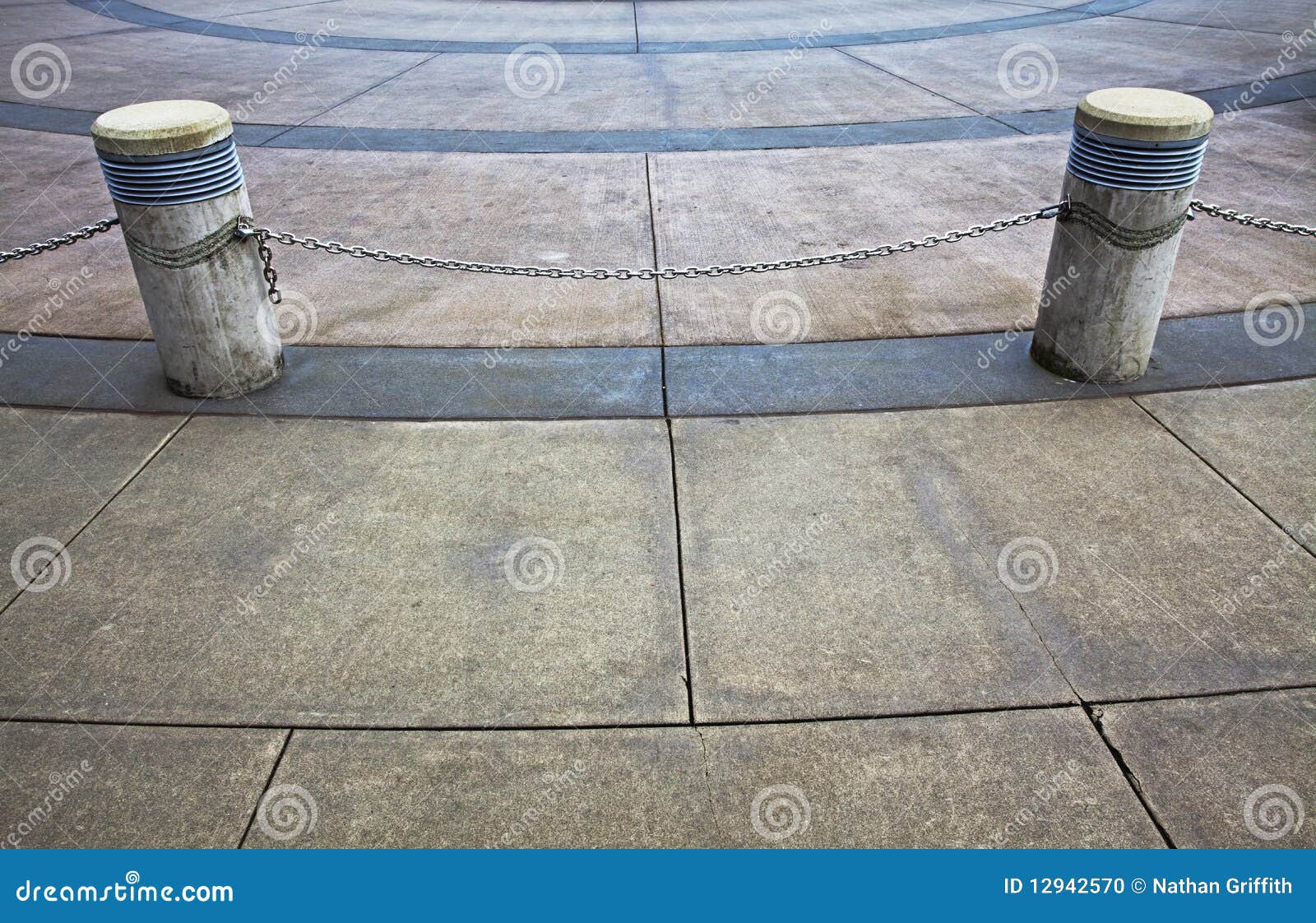 Pylons and Chains in Public Walkway Stock Photo - Image of divider ...