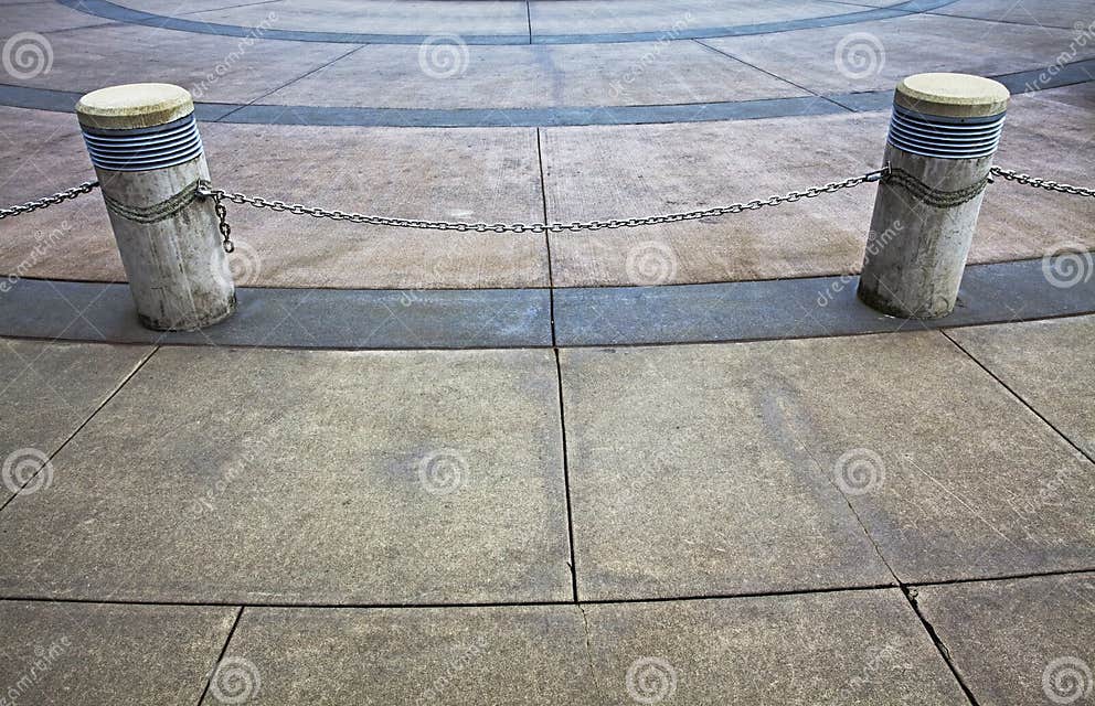 Pylons and Chains in Public Walkway Stock Photo - Image of divider ...