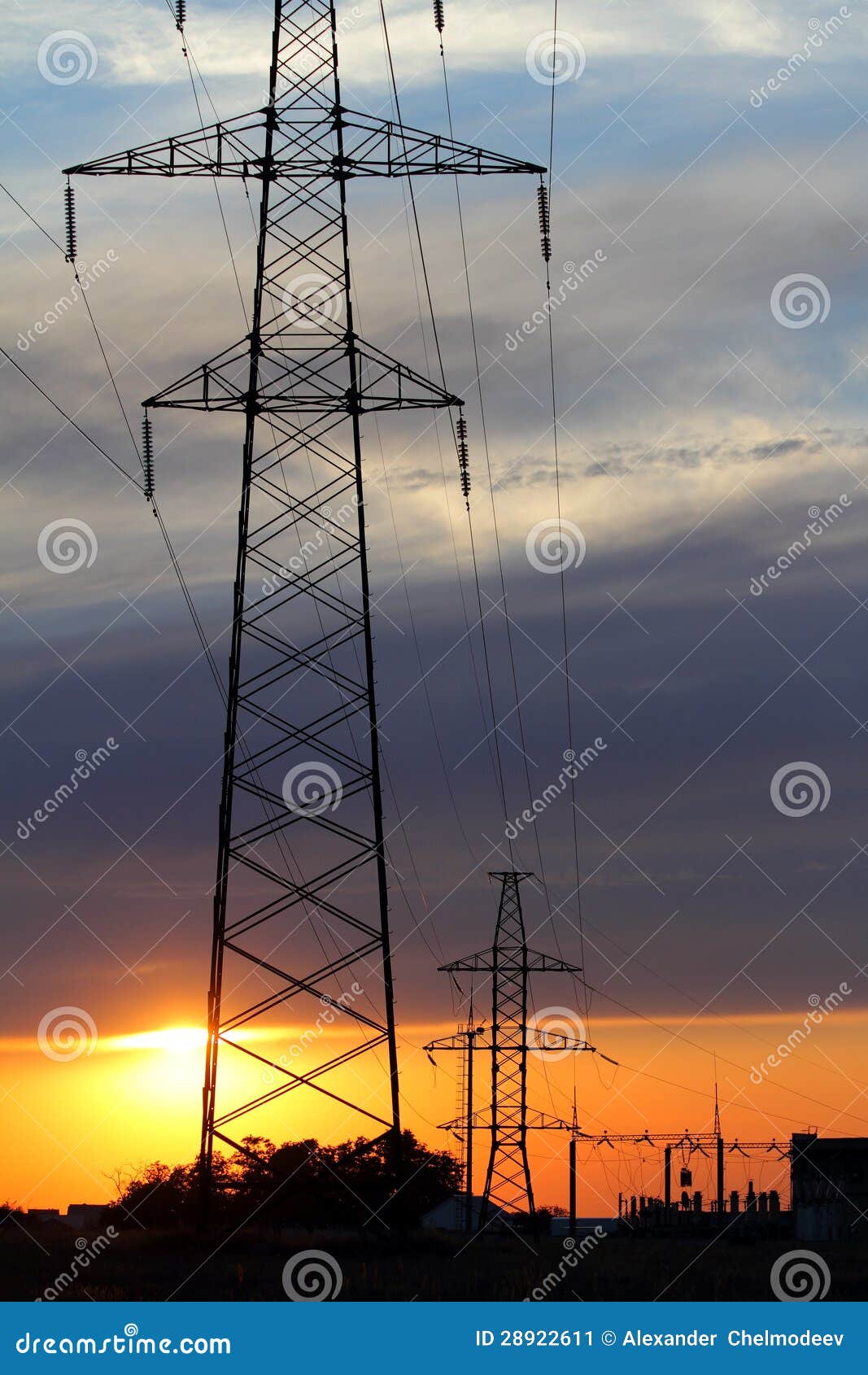 Pylons at sunset stock image. Image of setting, electrical - 28922611