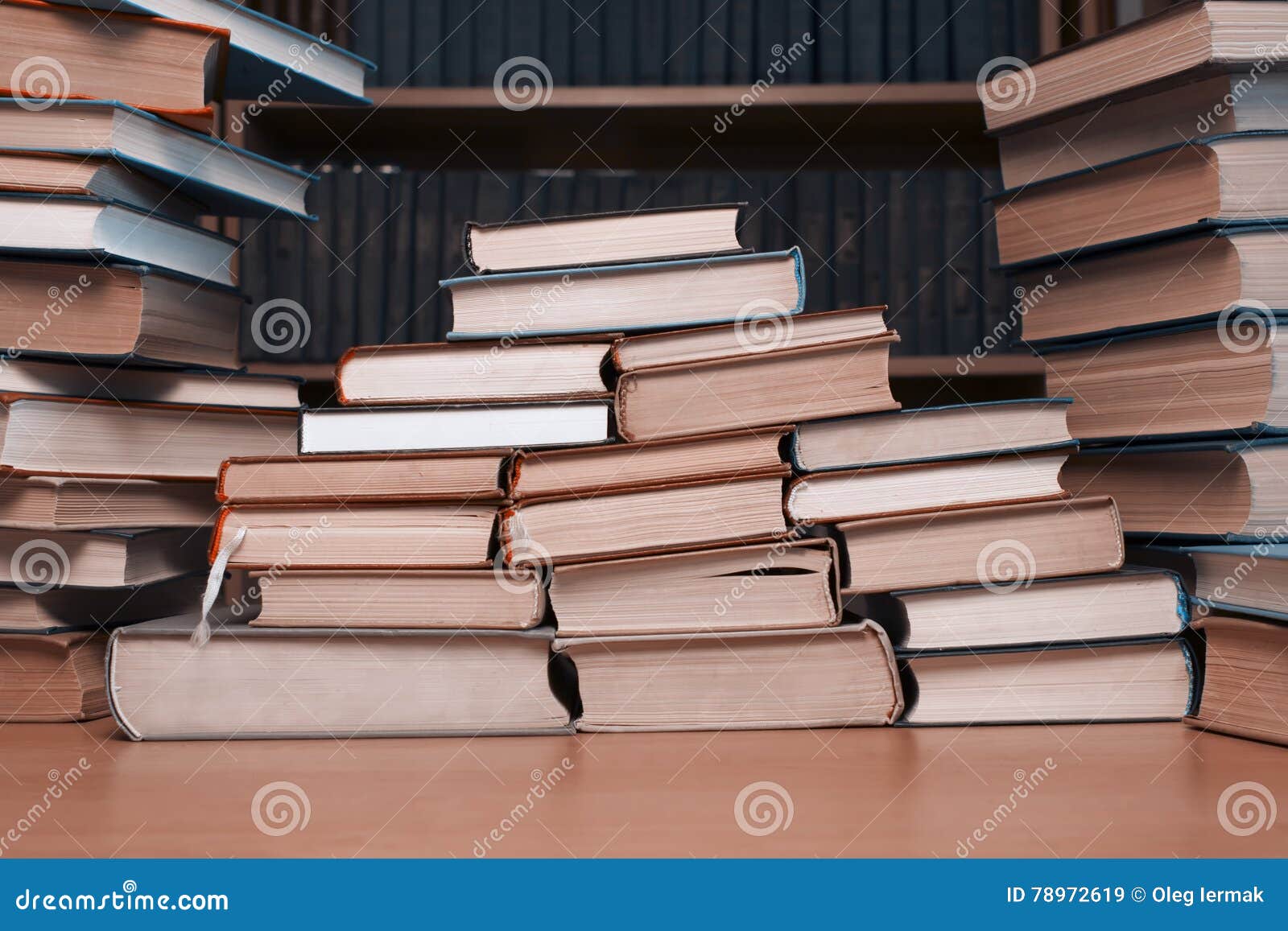 A Pyramid Of Books On The Table Stock Image | CartoonDealer.com #78972619