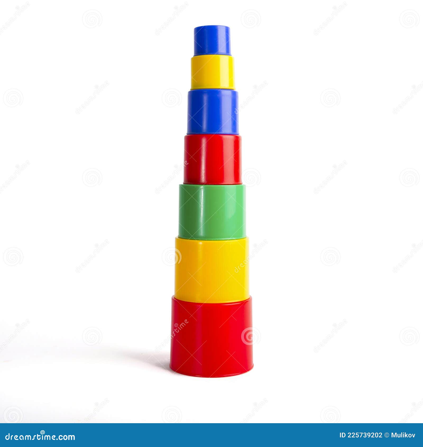 Pyramid Build from Colored Plastic Isolated on White Background. Stock ...