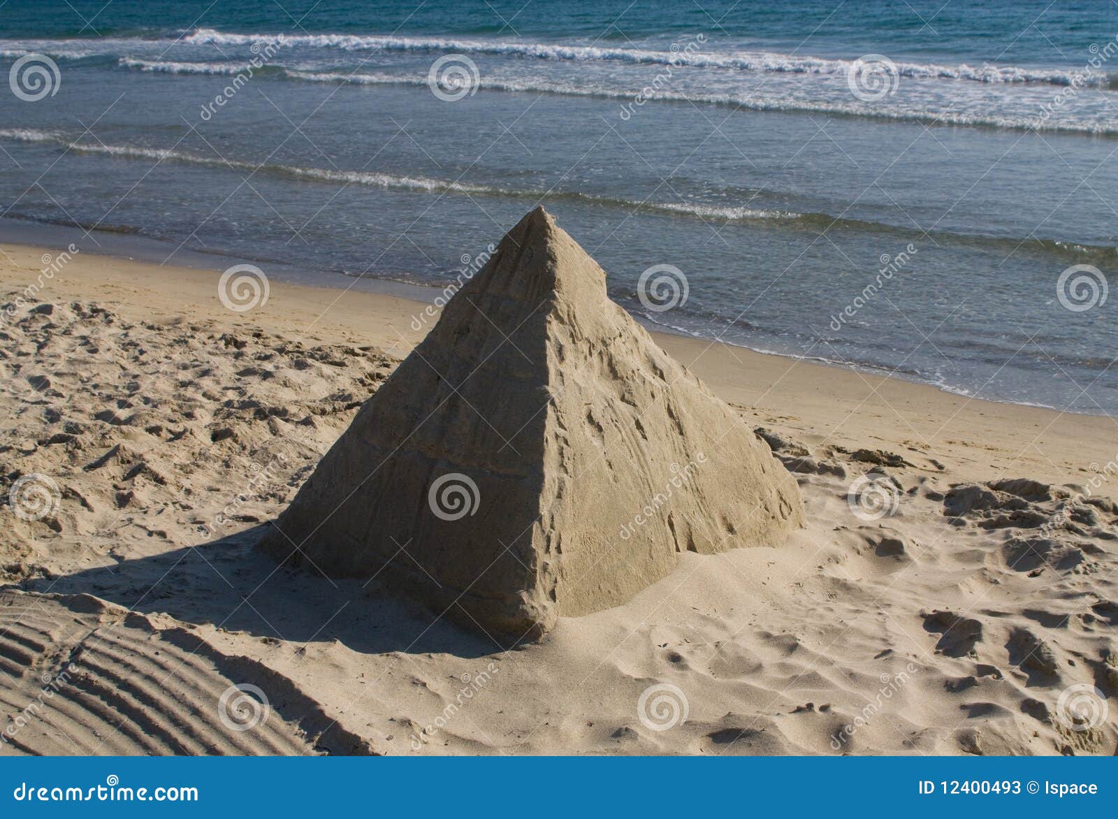 Pyramid made from sand stock image. Image of morning - 12400493