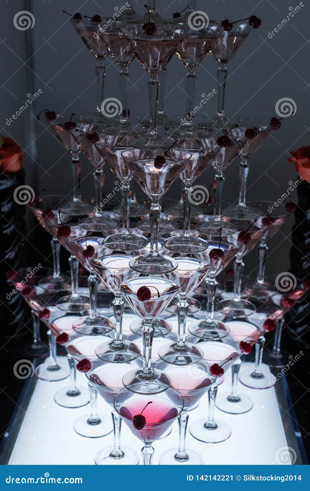 Pyramid of martini glasses stock image. Image of alcohol - 142142221