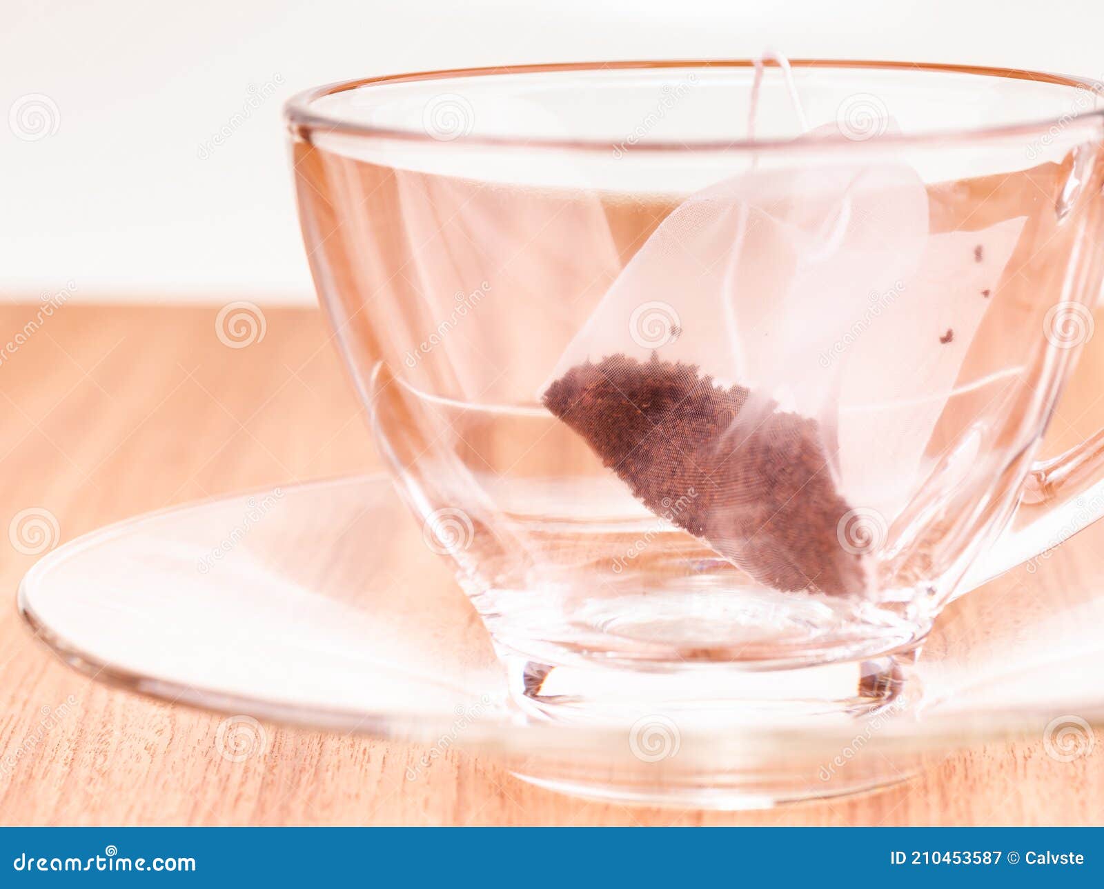 New Pyramid Mesh Teabag in a Glass Cup Close Up Stock Image - Image of ...
