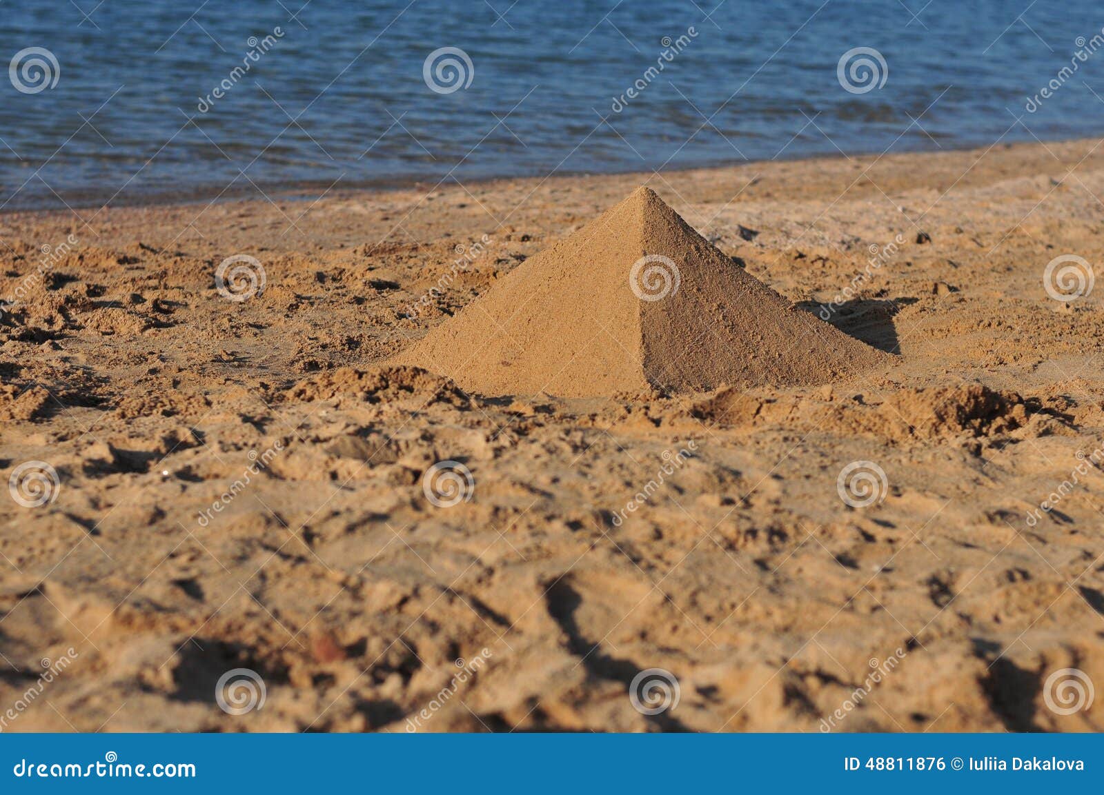A pyramid of sand stock photo. Image of tourism, solar - 48811876