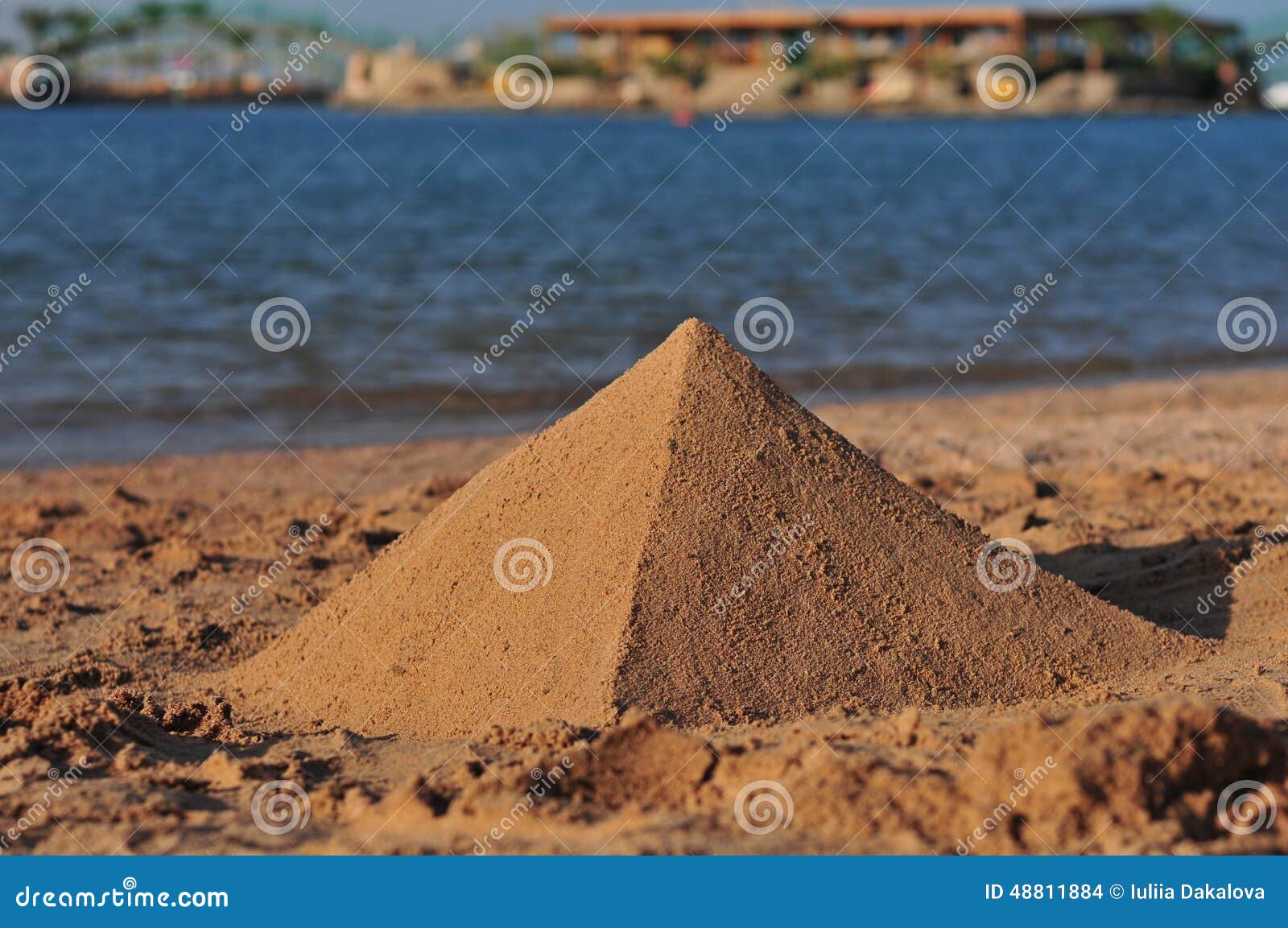 A pyramid of sand stock photo. Image of pyramids, blue - 48811884