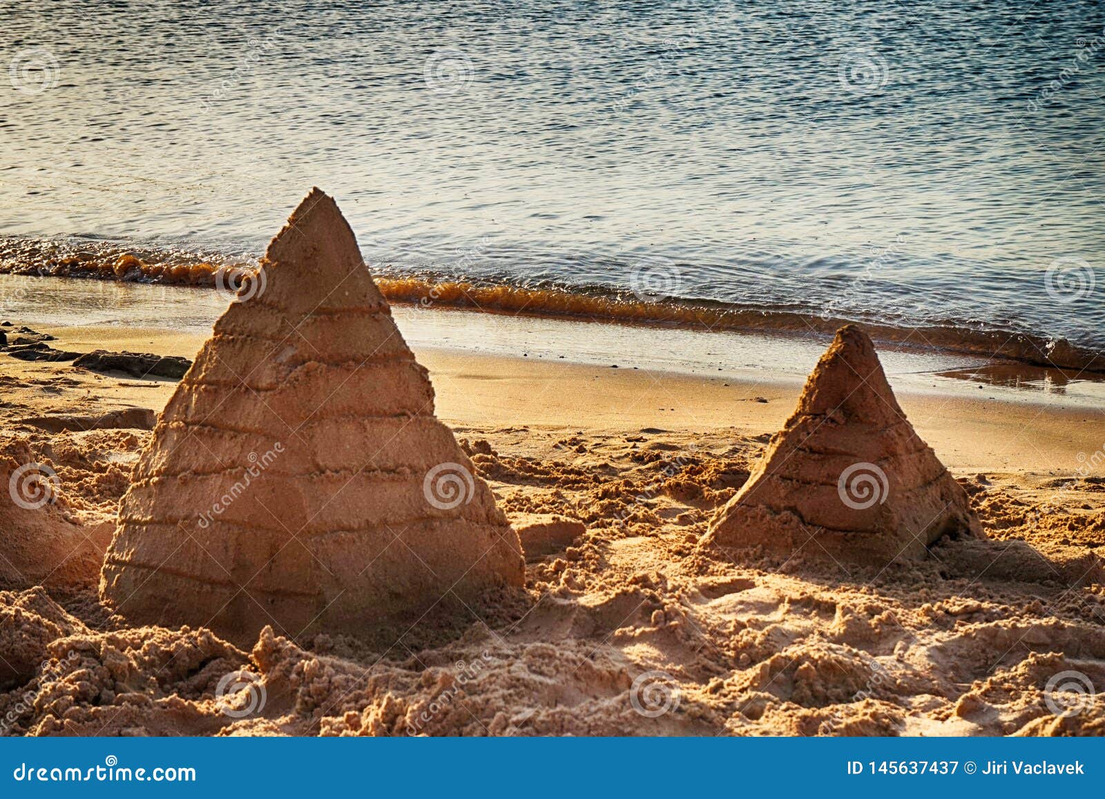 Pyramid from the sand stock image. Image of beautiful - 145637437