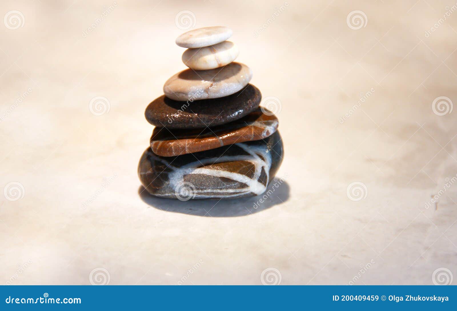 Pyramid of Sea Stones on a Marble Table. Sea Background Stock Image ...