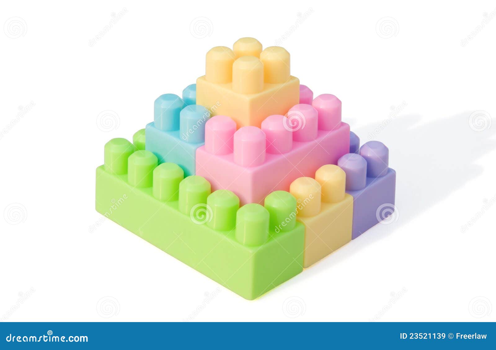 Pyramid shape toy bricks stock image. Image of blue, toys - 23521139