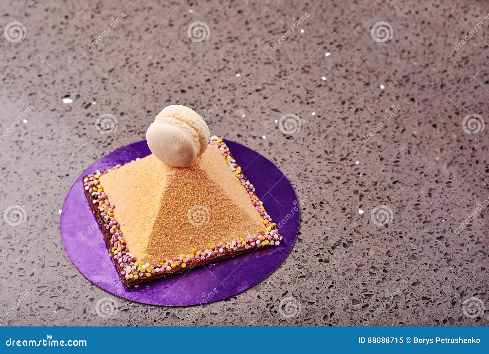 Pyramid Shaped Cake and Macaron. Stock Image - Image of background ...