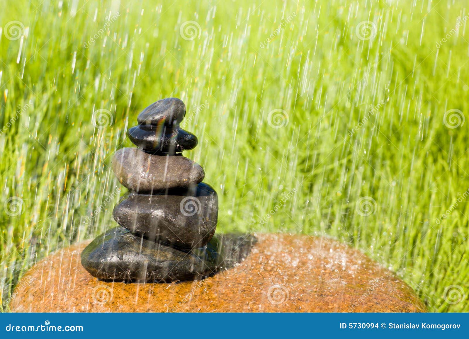 Pyramid from stones rain stock photo. Image of bubble - 5730994
