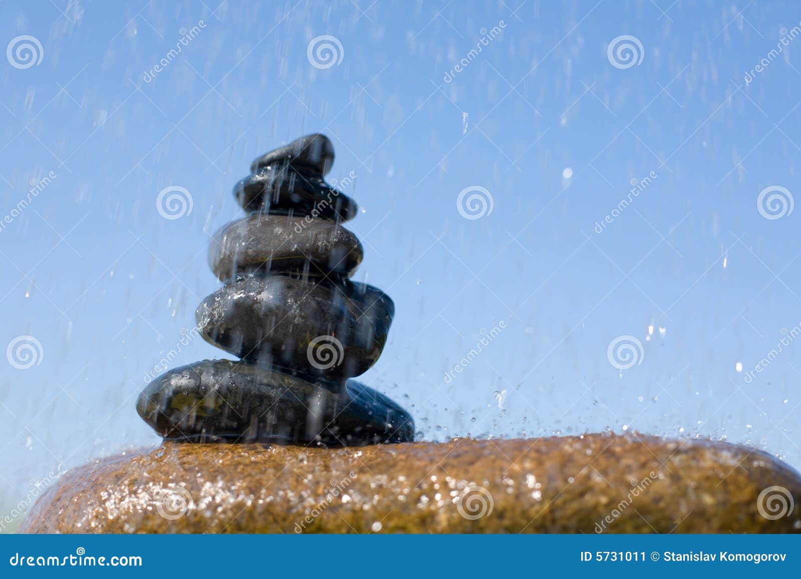 Pyramid stones & rain stock image. Image of concepts - 5731011