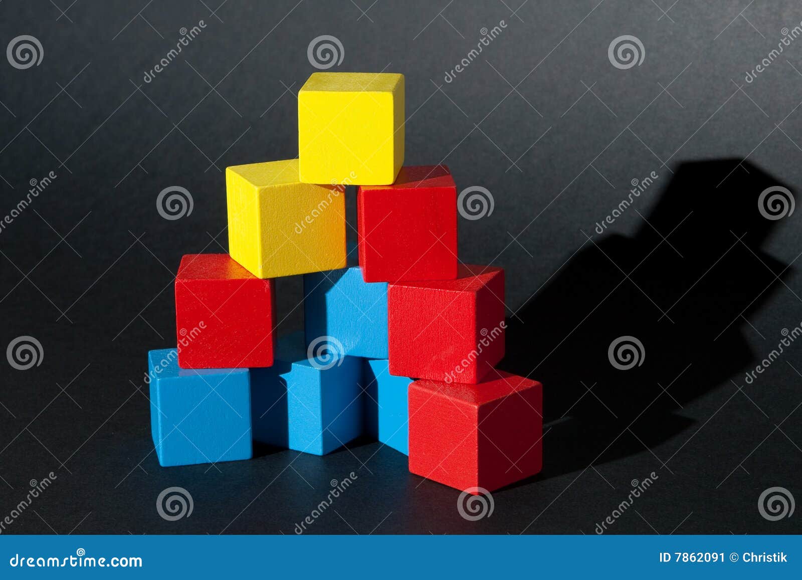 Pyramid of Wooden blocks stock image. Image of graphic - 7862091