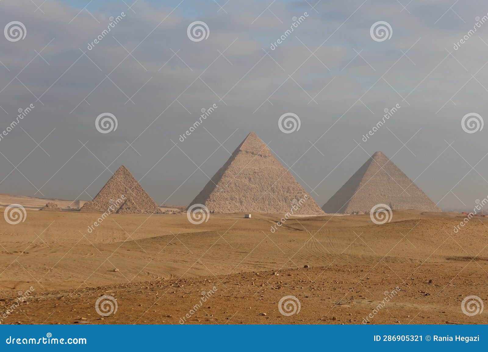 The Pyramids of Egypt Side by Side in the Middle of Desert Sand with ...