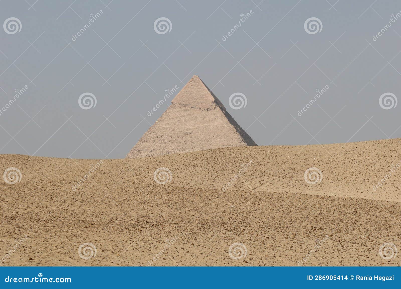 The Pyramids of Egypt Side by Side in the Middle of Desert Sand with ...