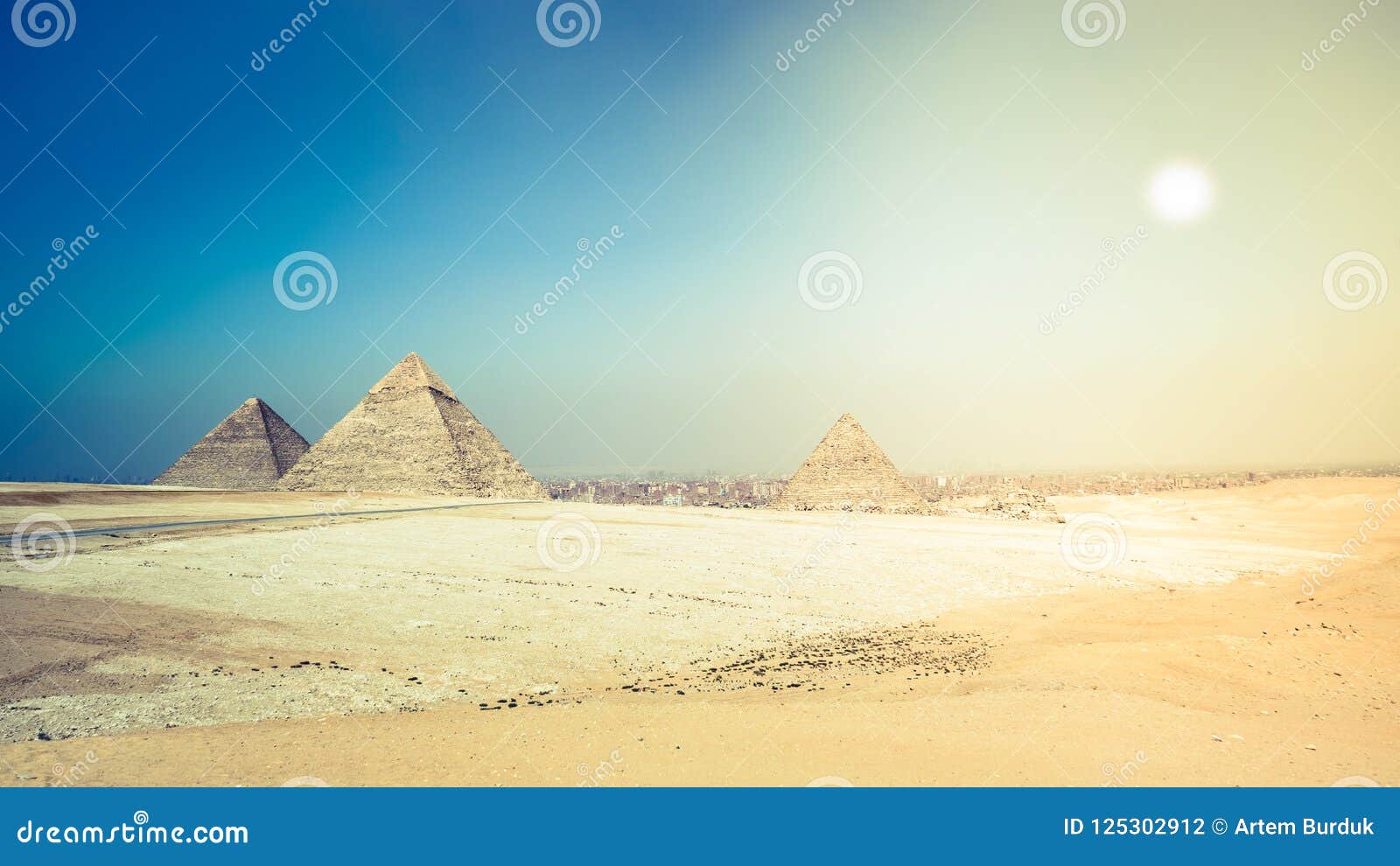 Pyramids of Giza on the Outskirts of Cairo Egypt. Stock Photo - Image ...