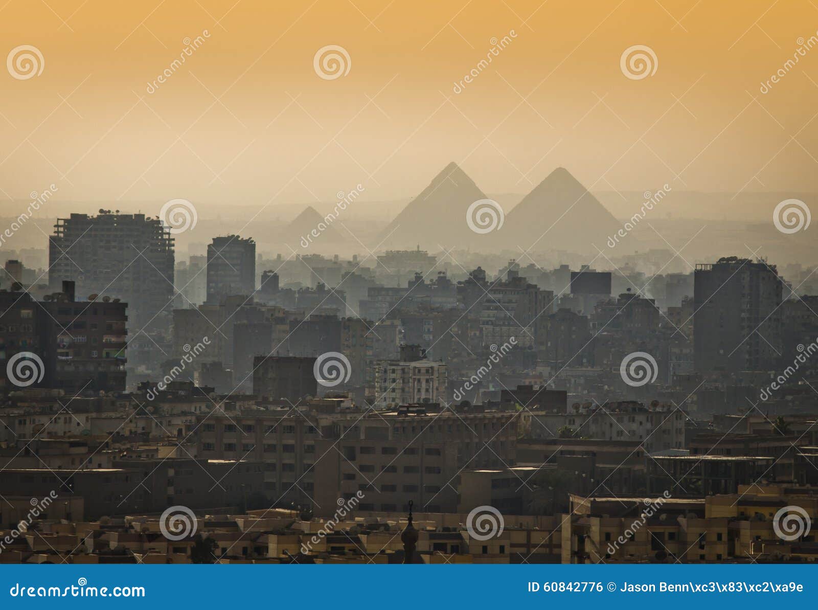 Pyramids in the mist. stock photo. Image of egyptian - 60842776