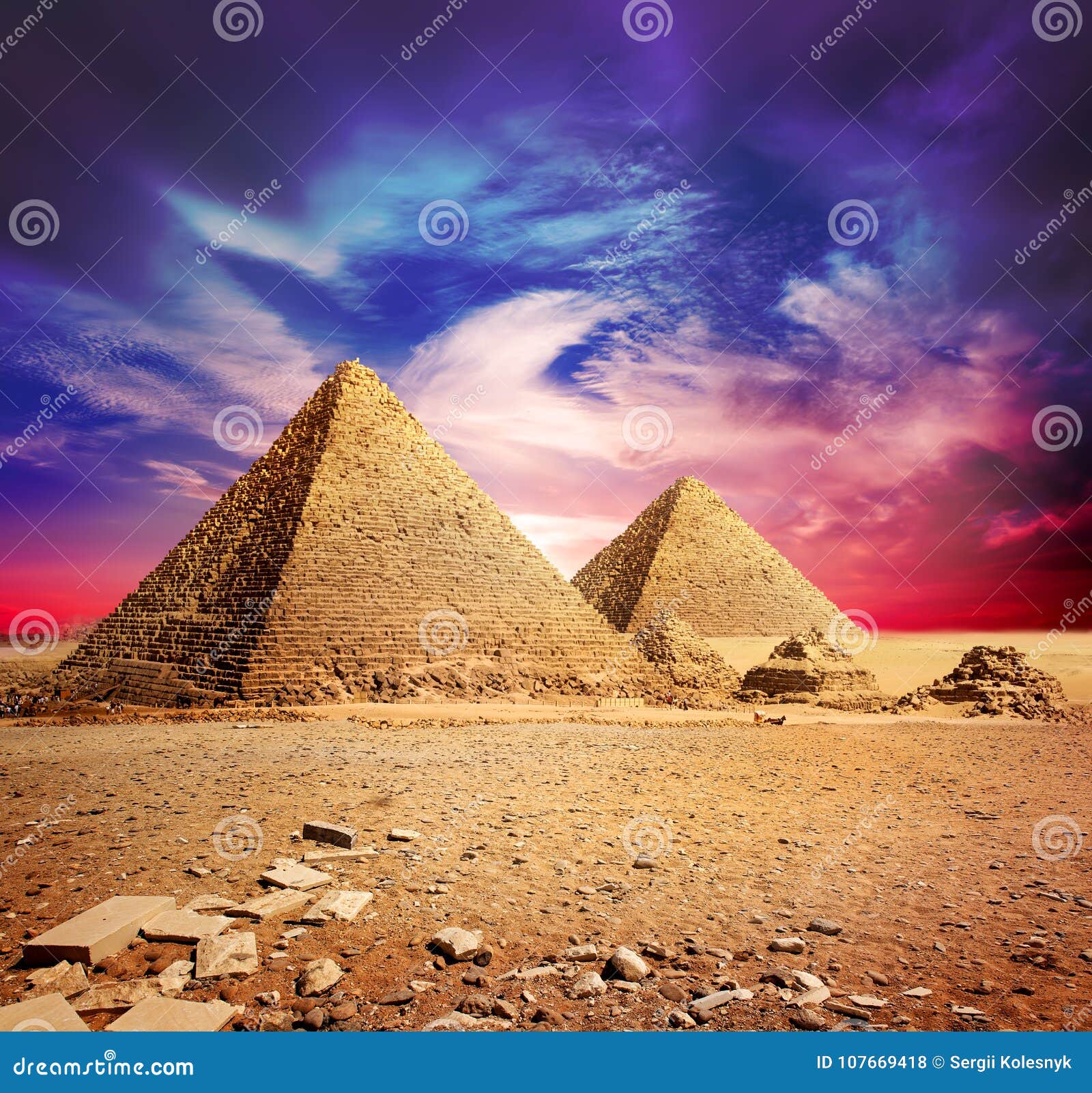 Pyramids and violet clouds stock photo. Image of architecture - 107669418
