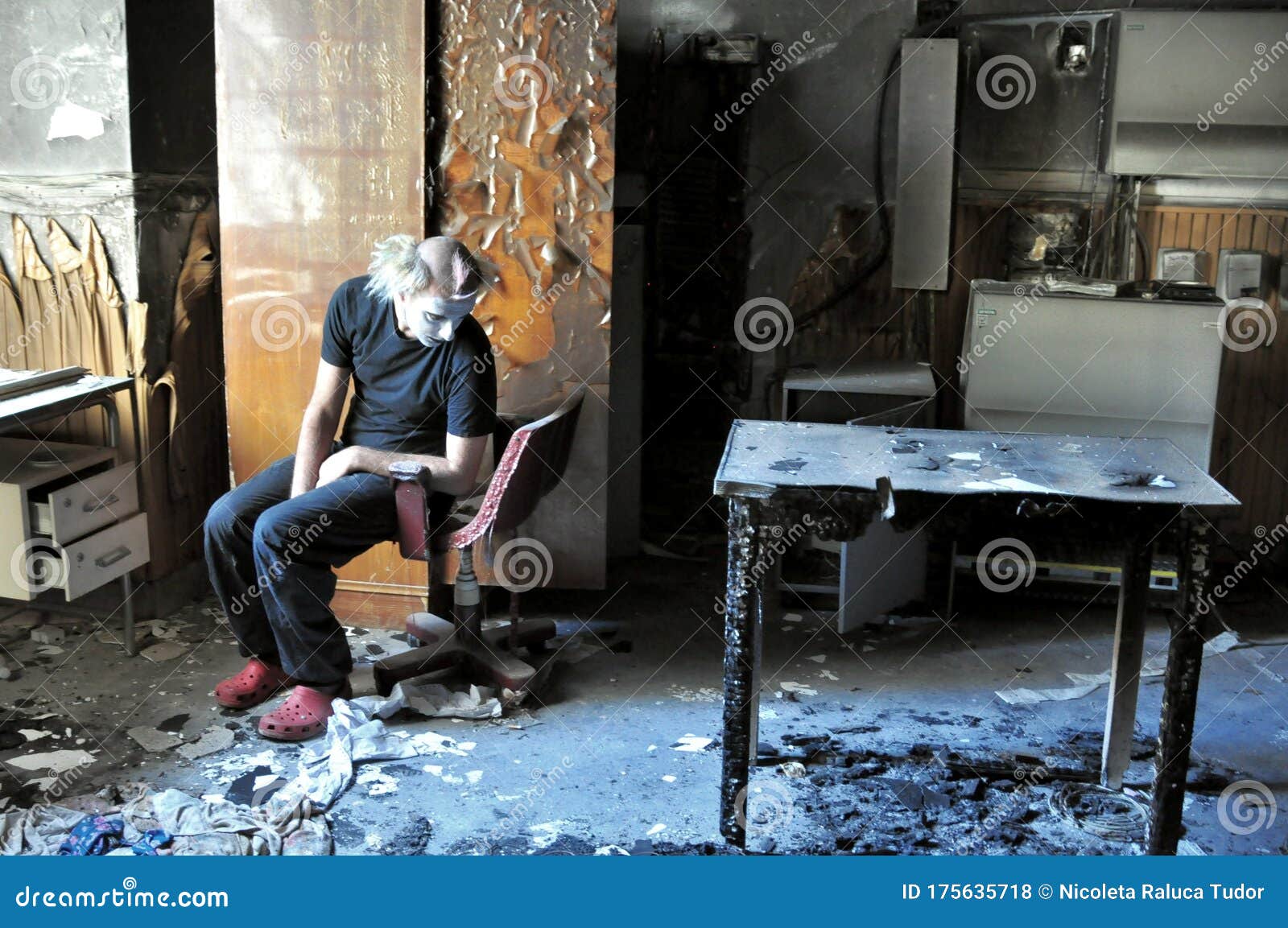 Pyromaniac Man in a Room with Burnt Objects, Madness Concept Stock ...